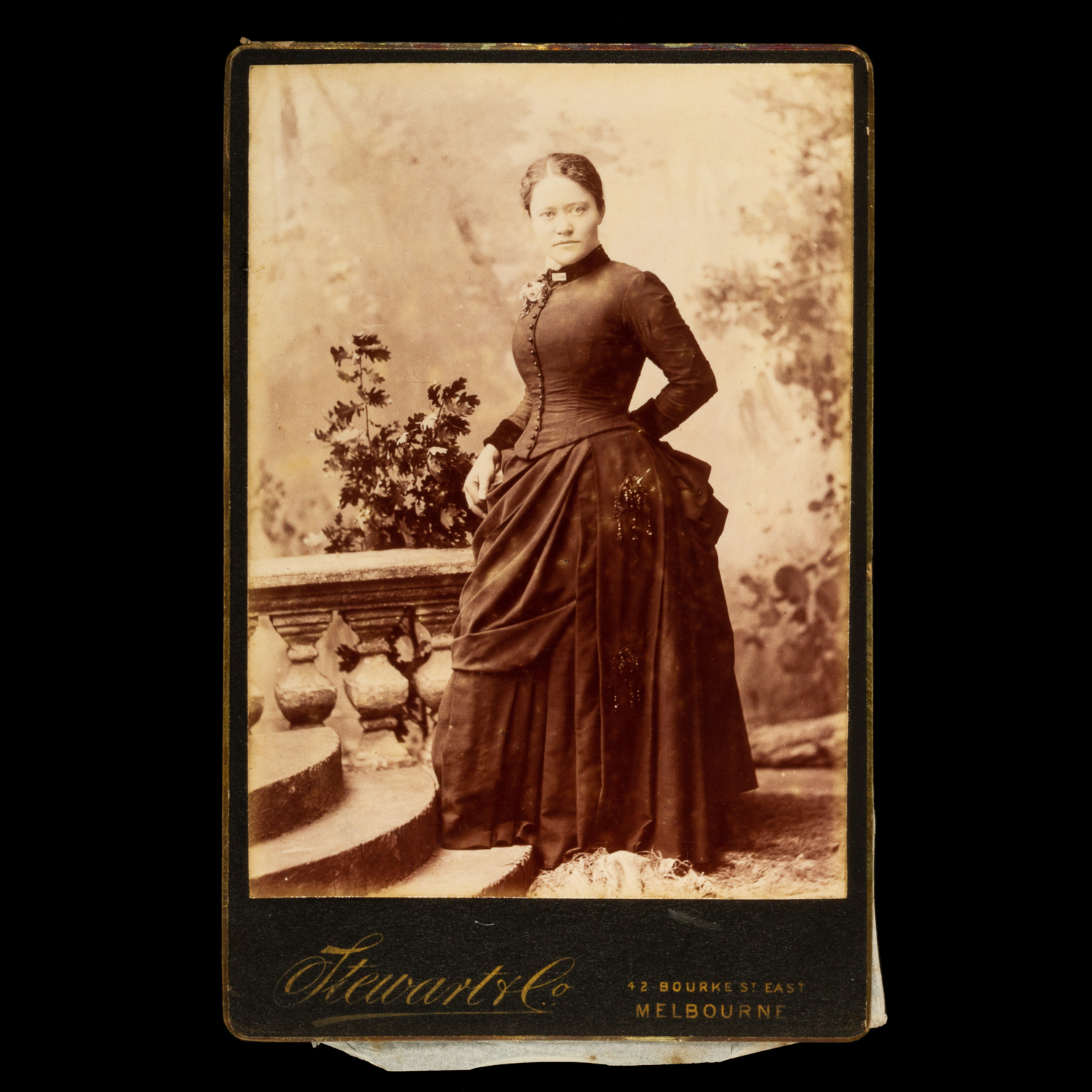 Studio portrait of a young woman, possibly of Polynesian heritage ...